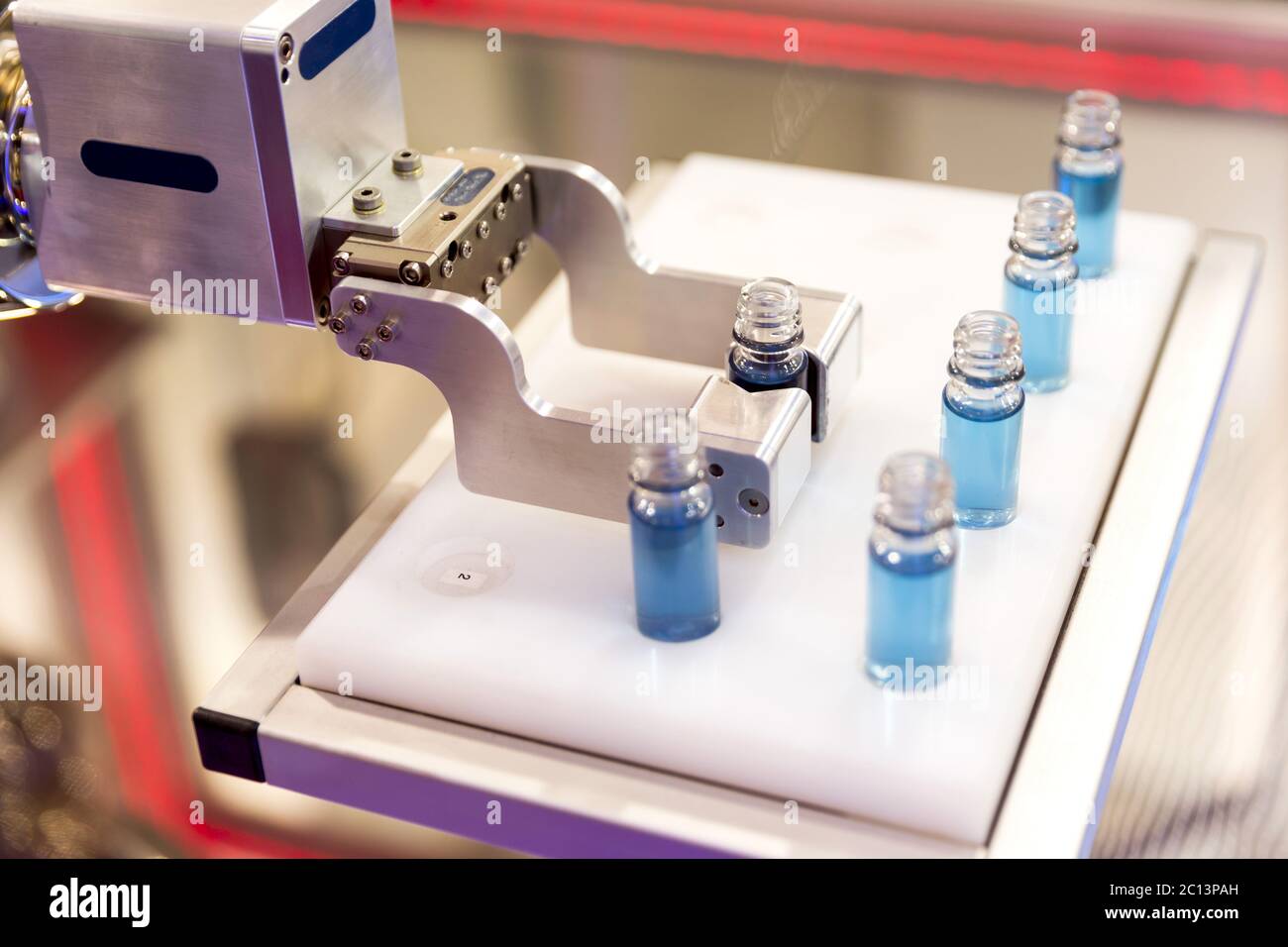 Robot mechanical arm with chemical tubes in a medical laboratory Stock ...