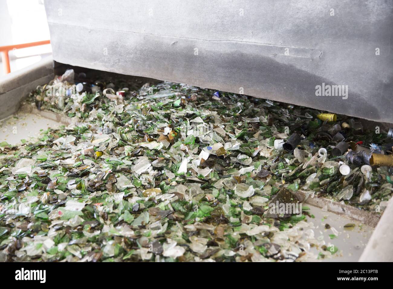 Glass waste in recycling facility. Glass particles in a machine Stock ...