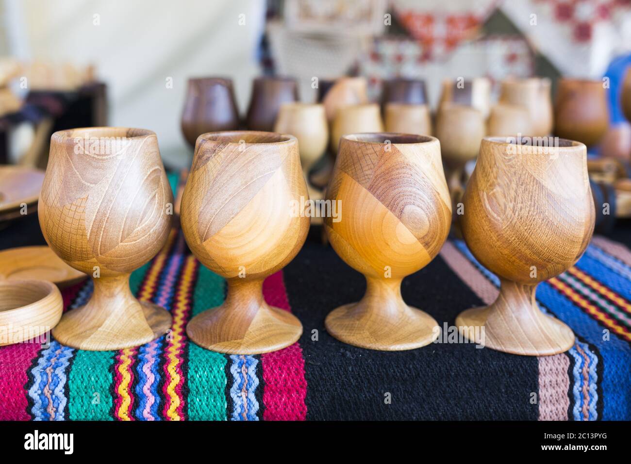 Four wooden cups Stock Photo - Alamy