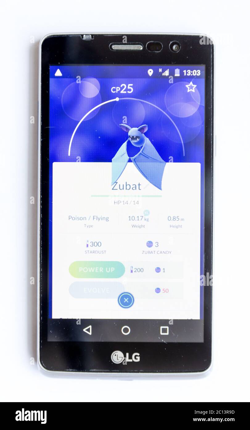 A mobile phone showing on screen Pokemon Go augmented reality mobile ...