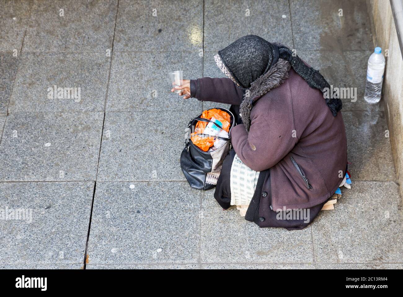 Anonymous beggar hi-res stock photography and images - Alamy