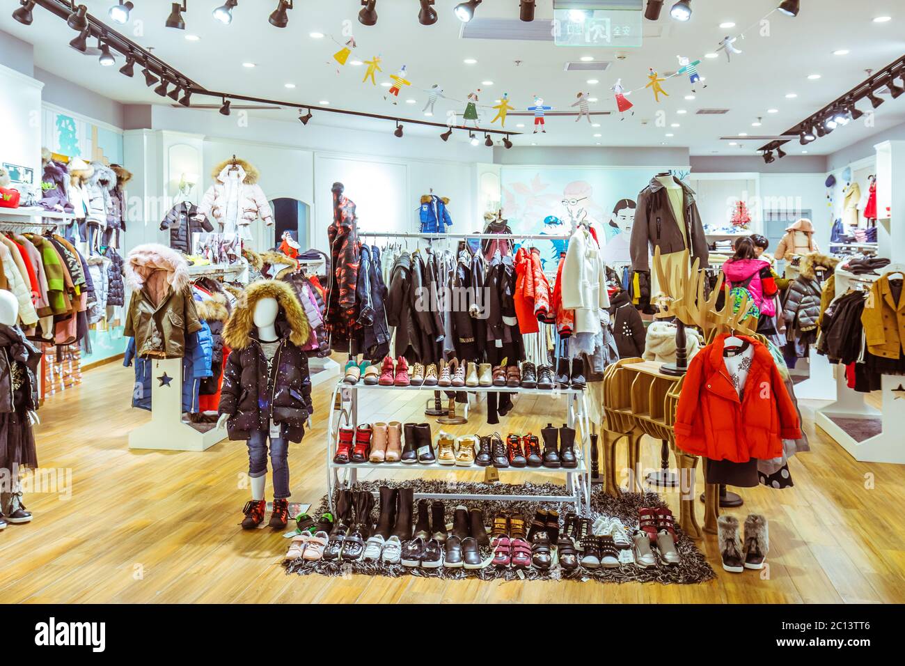 fashion clothes in shopping mall Stock Photo - Alamy