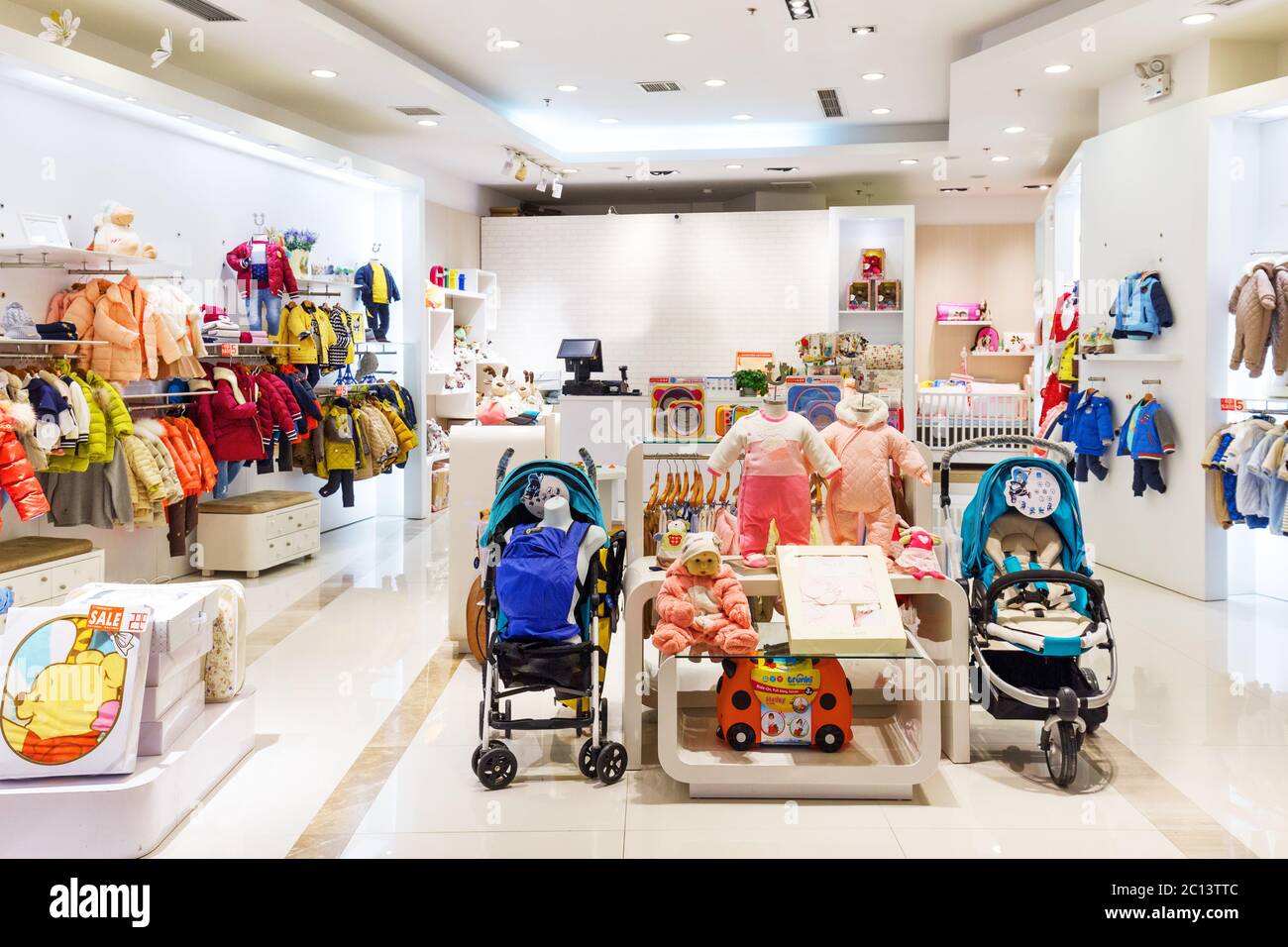 fashion clothes in shopping mall Stock Photo - Alamy