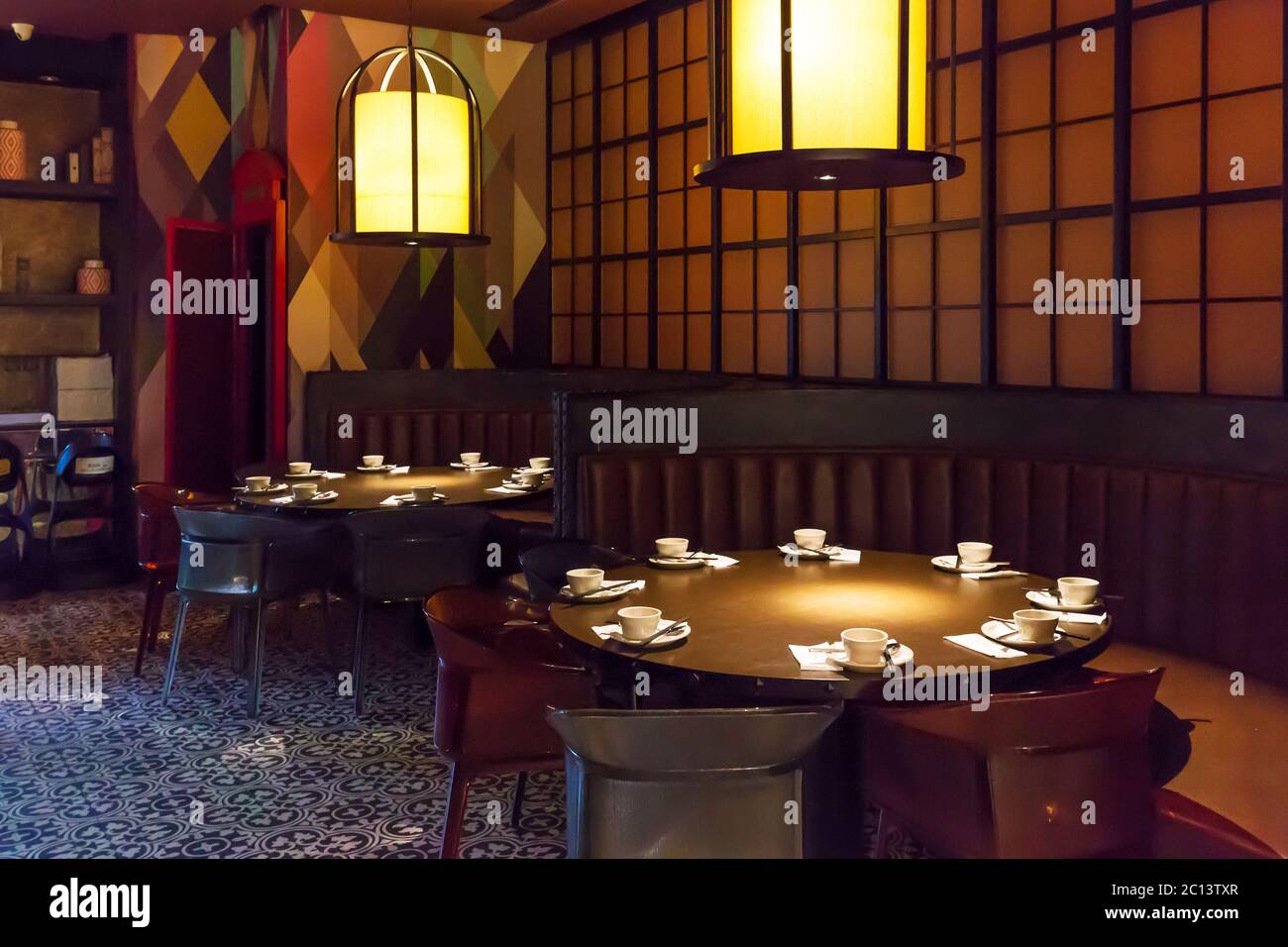 modern room with tables and chairs Stock Photo - Alamy