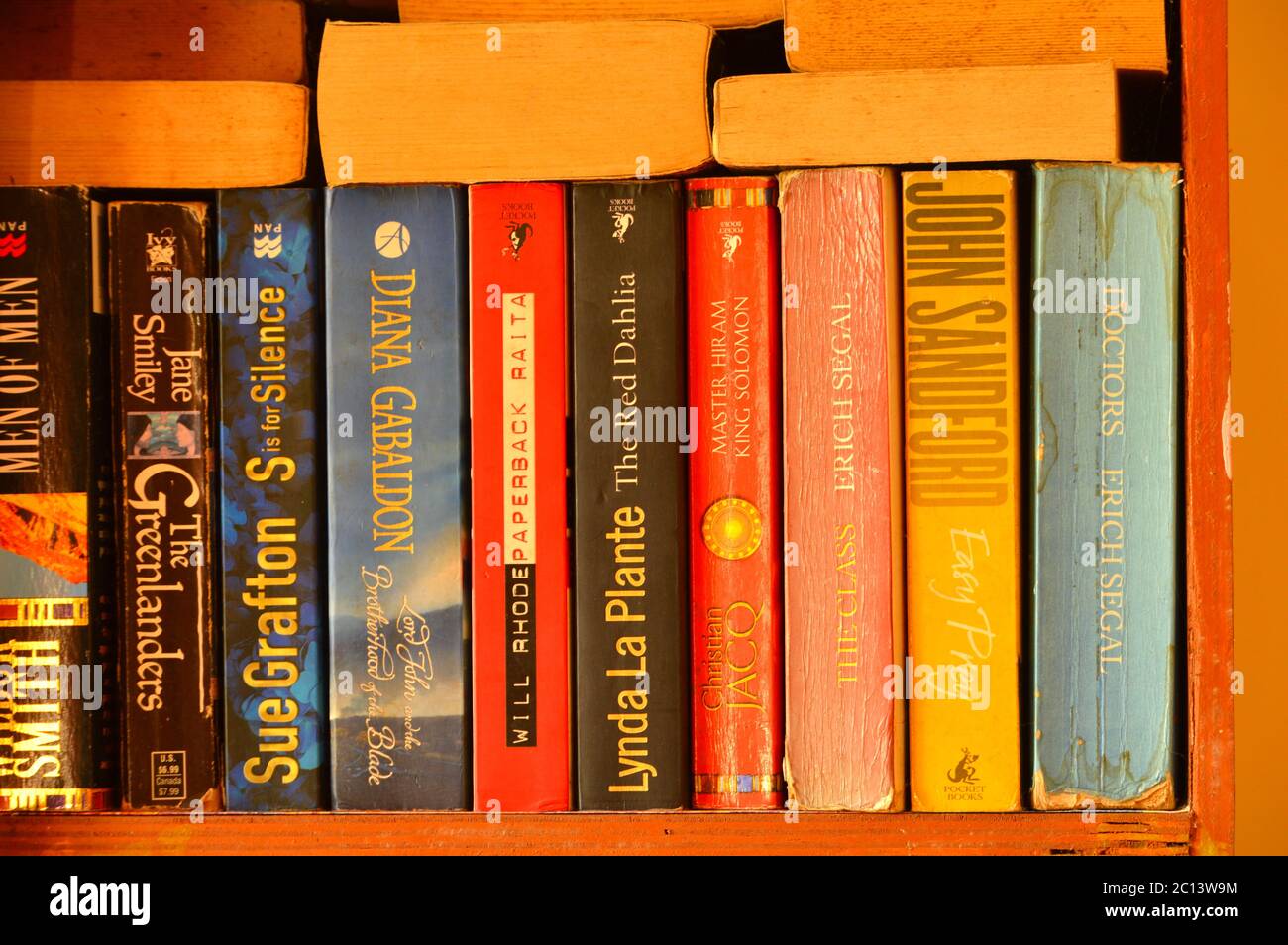 books arranged in a pattern in focus forming a beautiful background ...