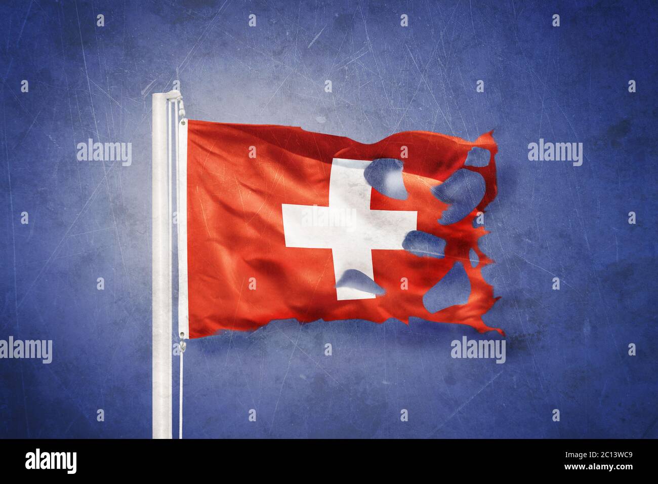 Torn flag of Switzerland flying against grunge background Stock Photo ...
