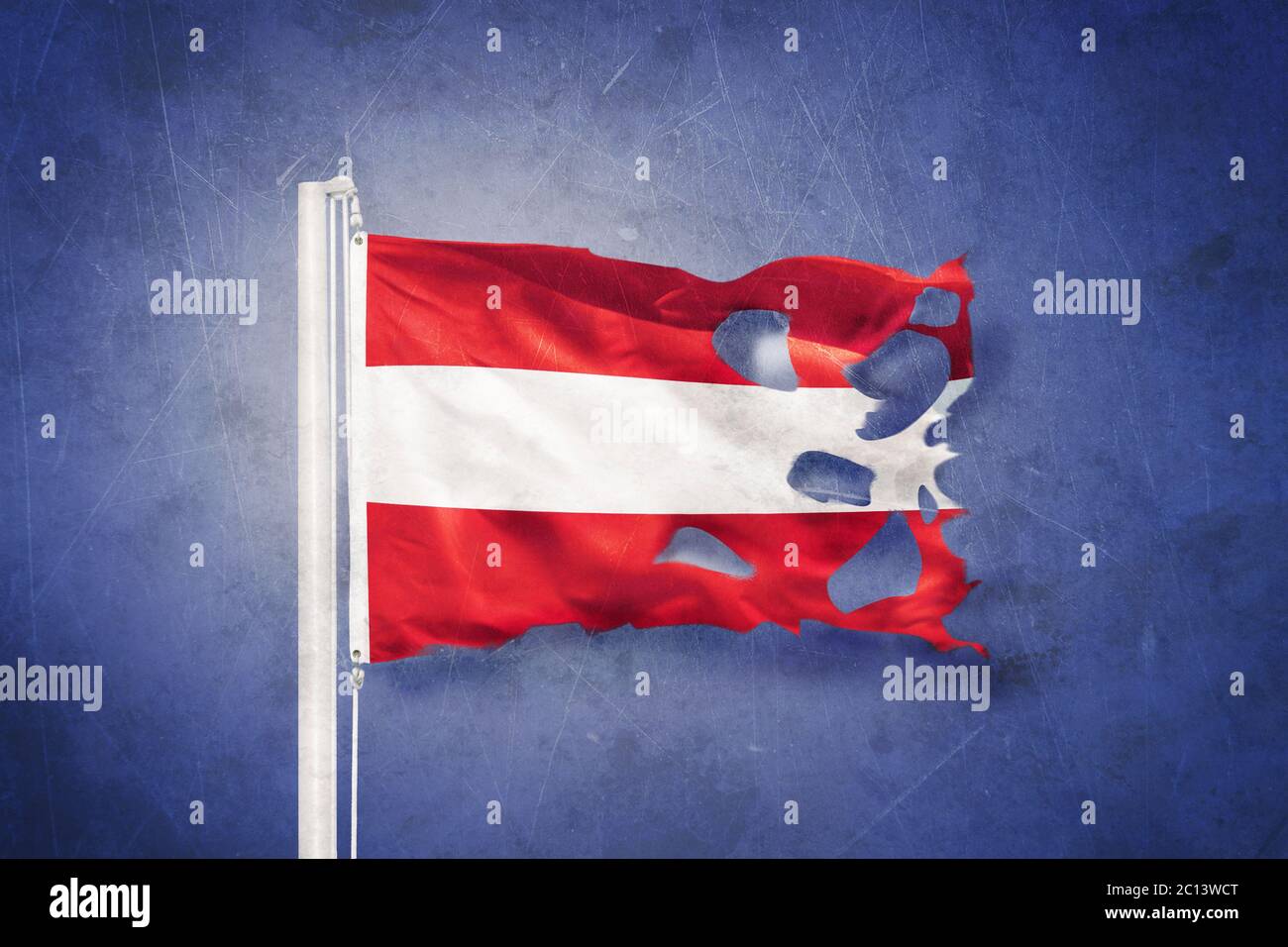 Torn flag of Austria flying against grunge background Stock Photo - Alamy