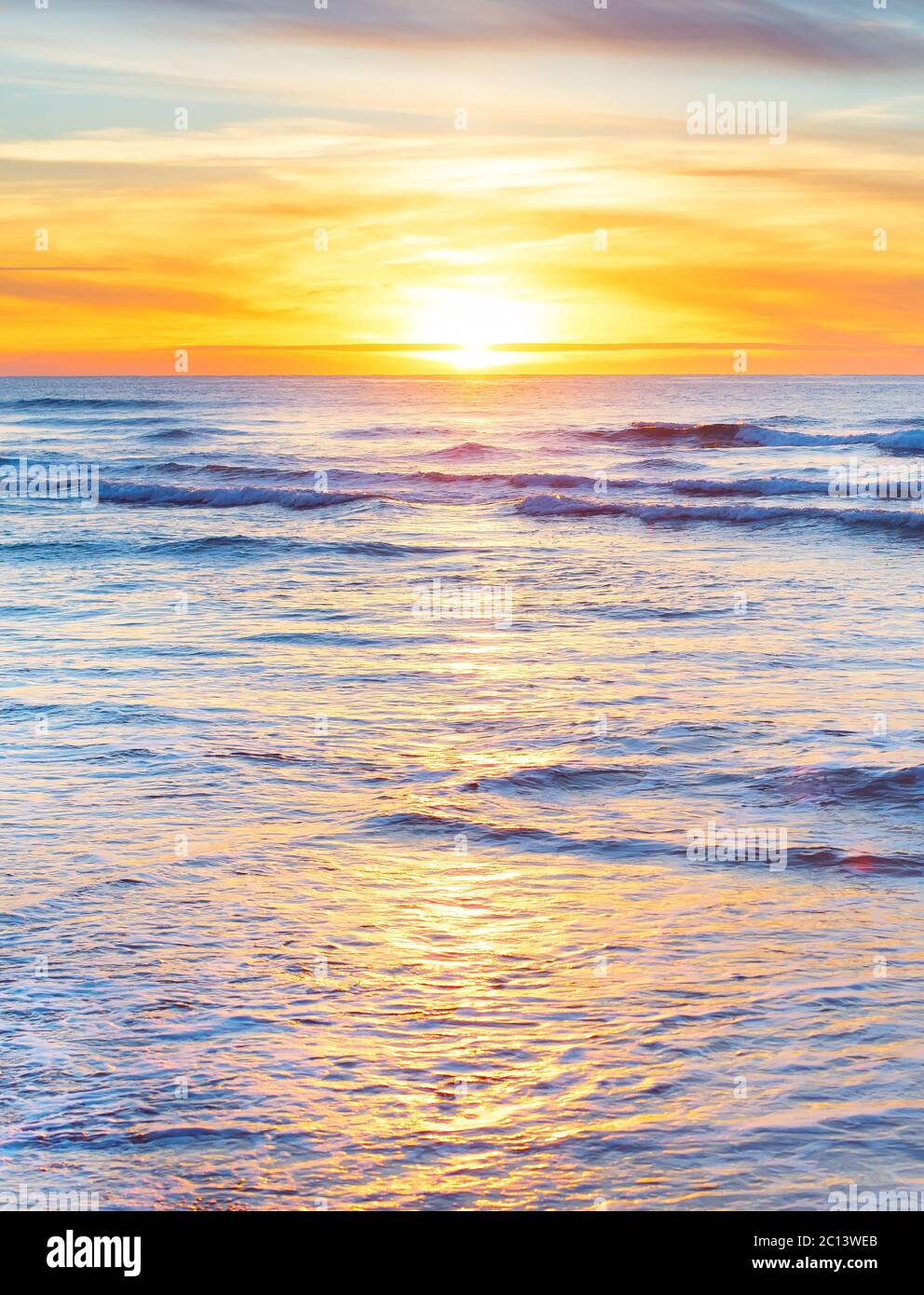 Ocean sunset, vertical Stock Photo - Alamy