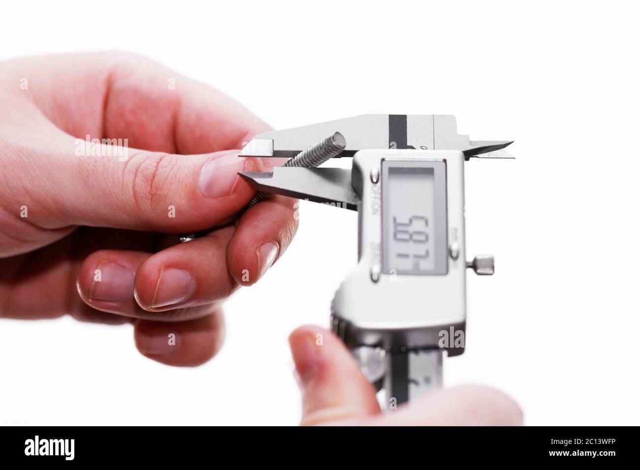 Digital Caliper in a man hand isolated on white background Stock Photo ...