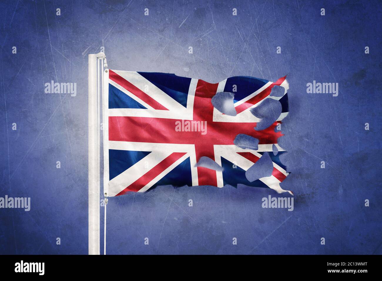 Torn flag of United Kingdom flying against grunge background Stock ...