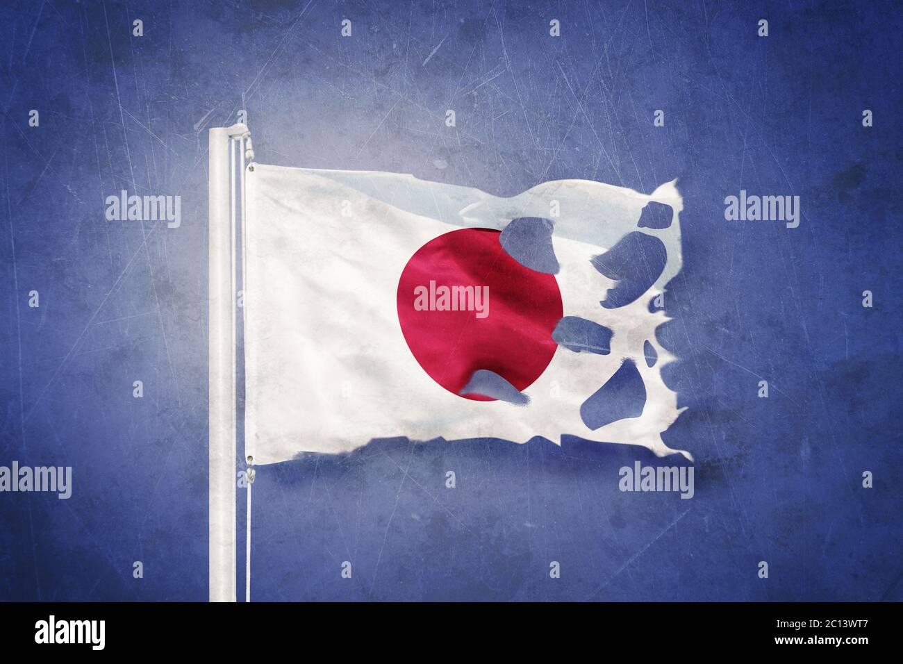 Torn flag of Japan flying against grunge background Stock Photo - Alamy