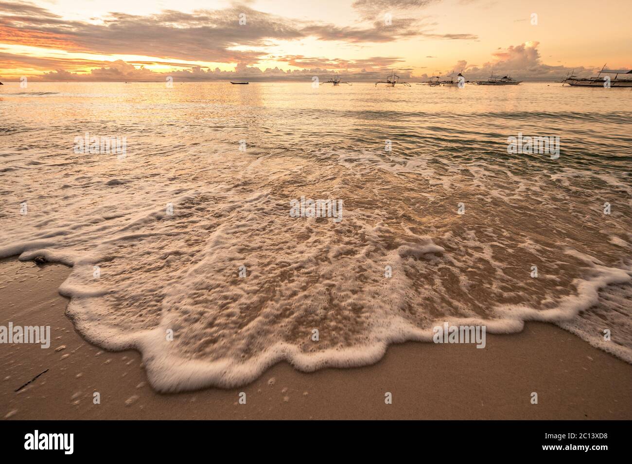 Tropical beach sunset at Philippines Stock Photo - Alamy