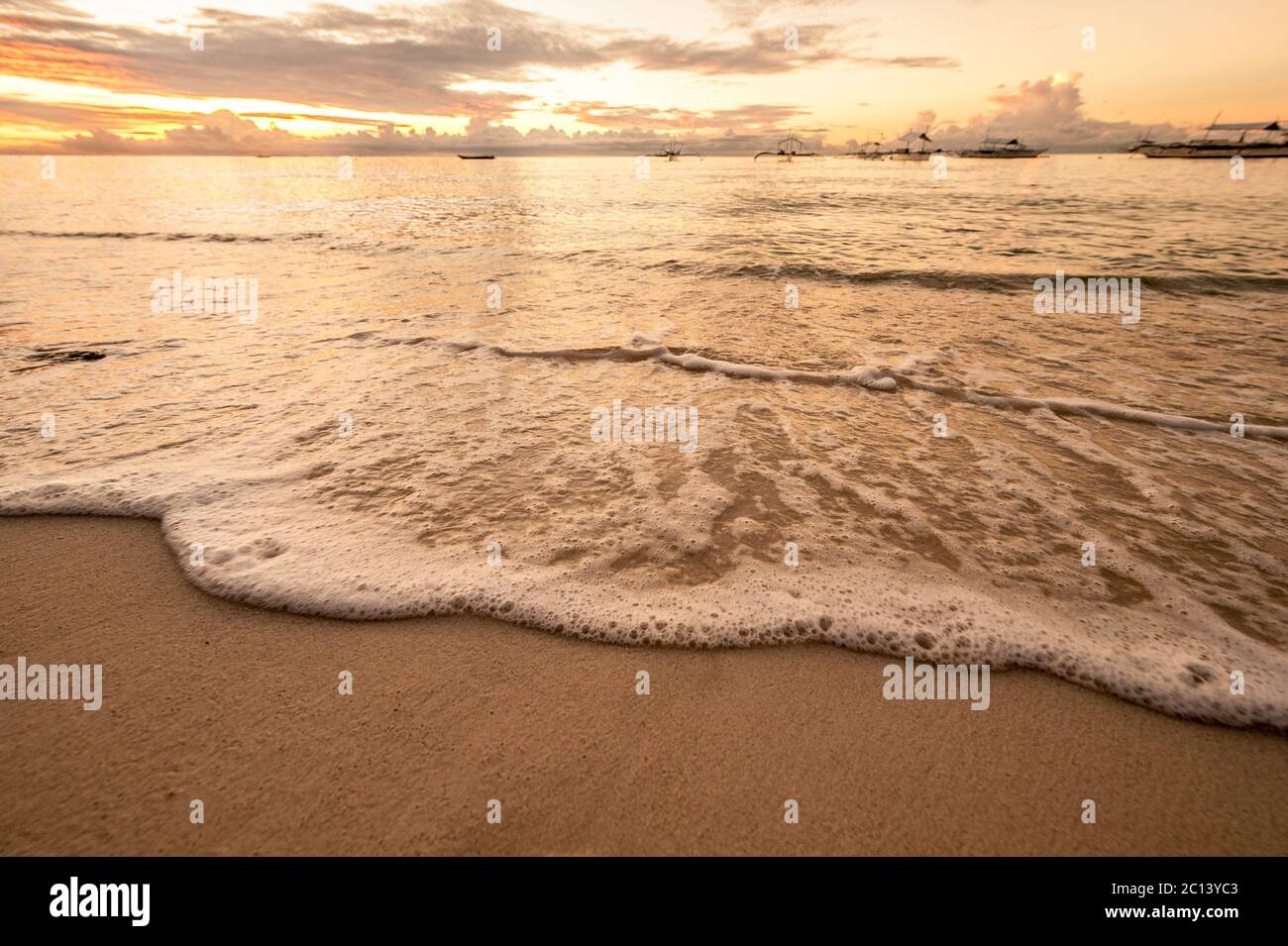Tropical beach sunset at Philippines Stock Photo - Alamy