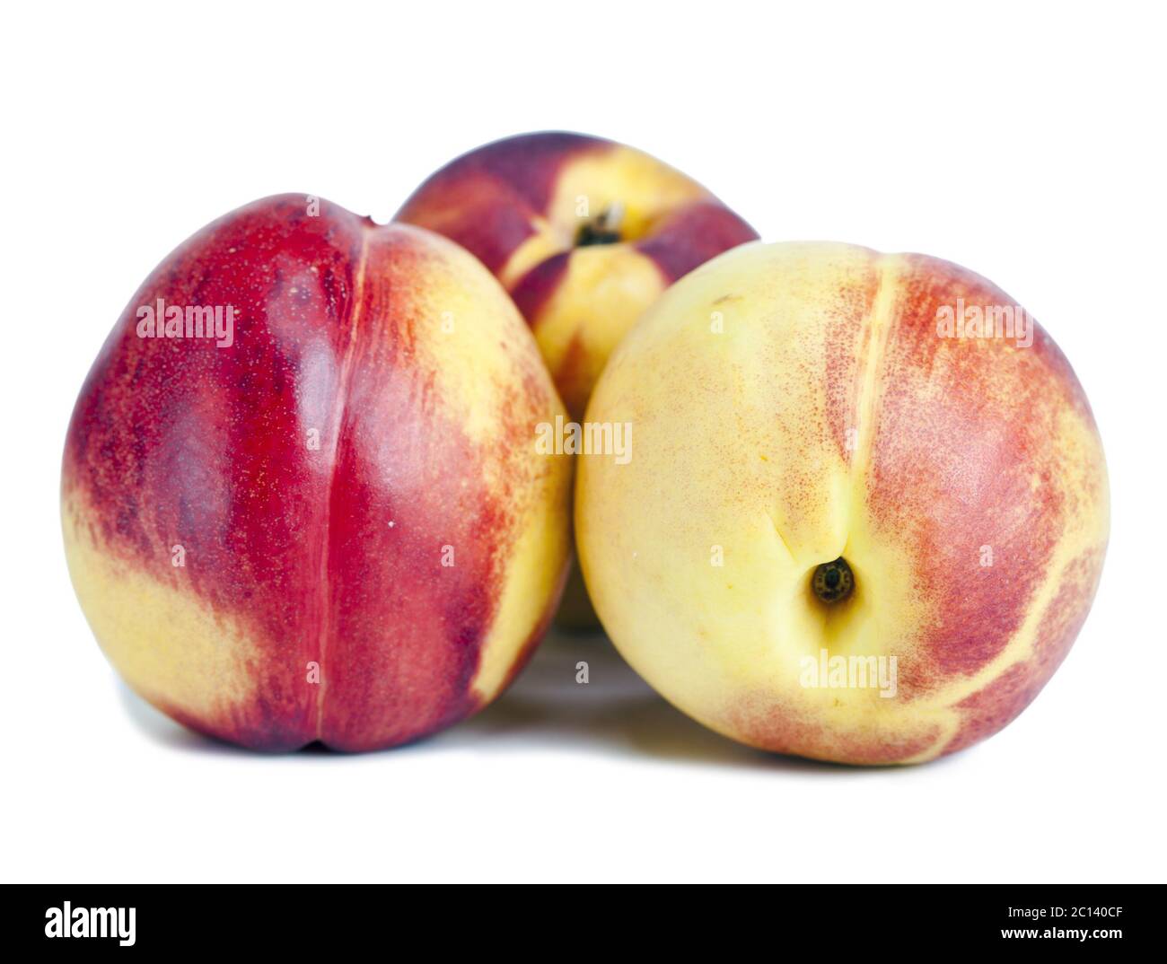 Ripe nectarines on a white background Stock Photo - Alamy
