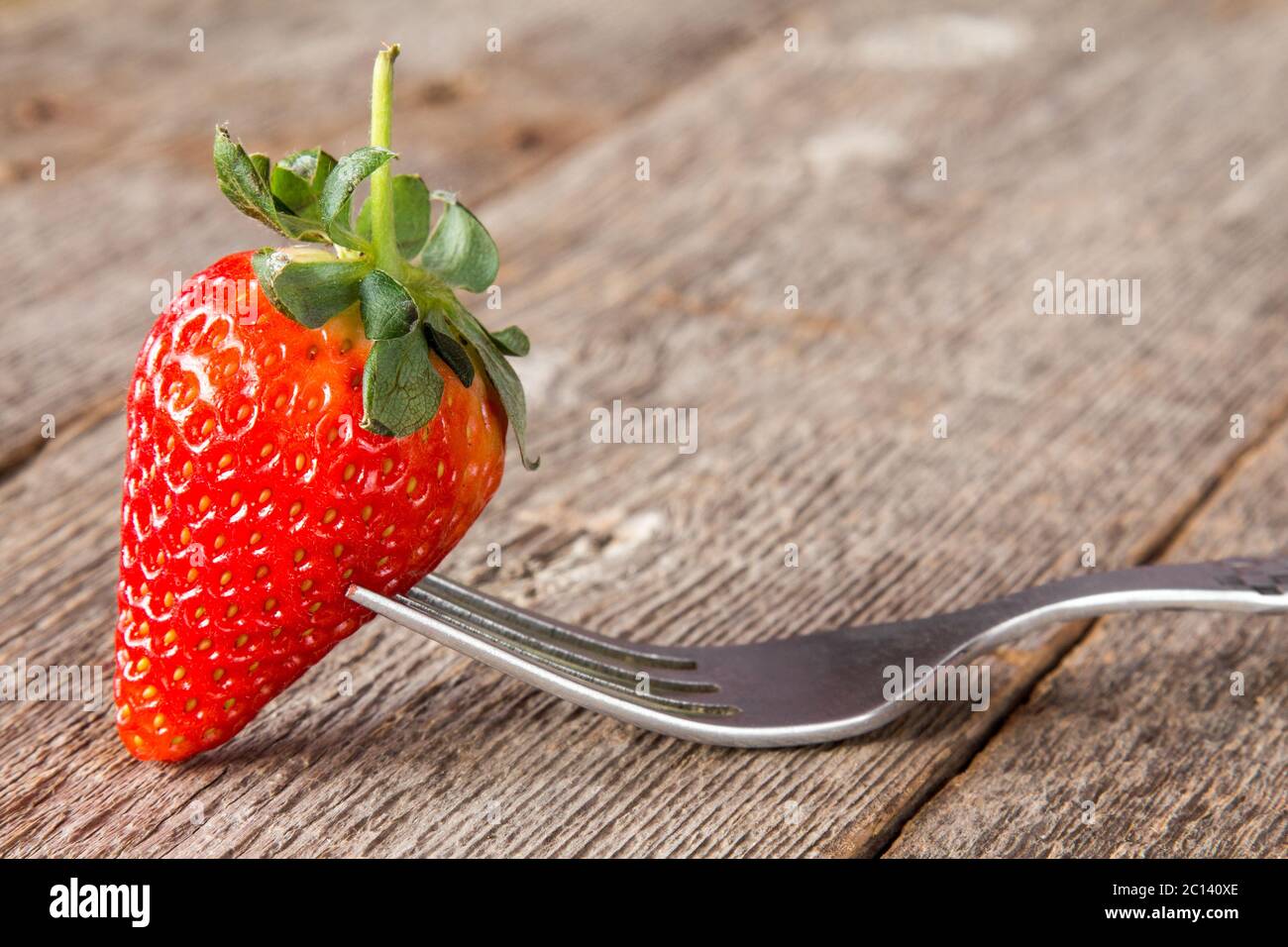 Fork strawberry hi-res stock photography and images - Alamy