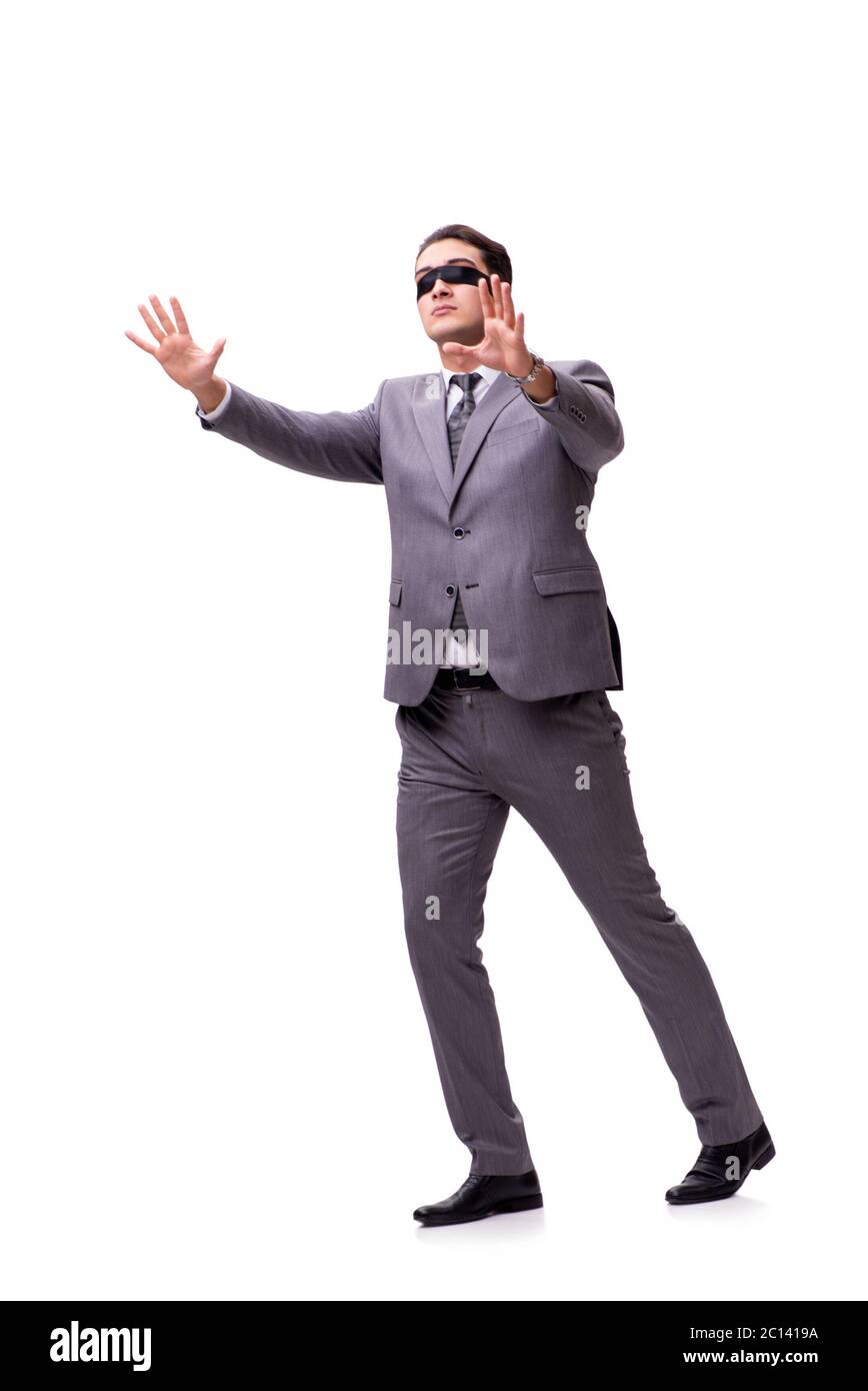 Blindfolded businessman isolated on white Stock Photo - Alamy
