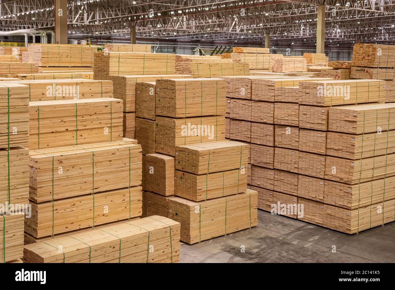 wooden factory piles pallets storage inside shed Stock Photo - Alamy