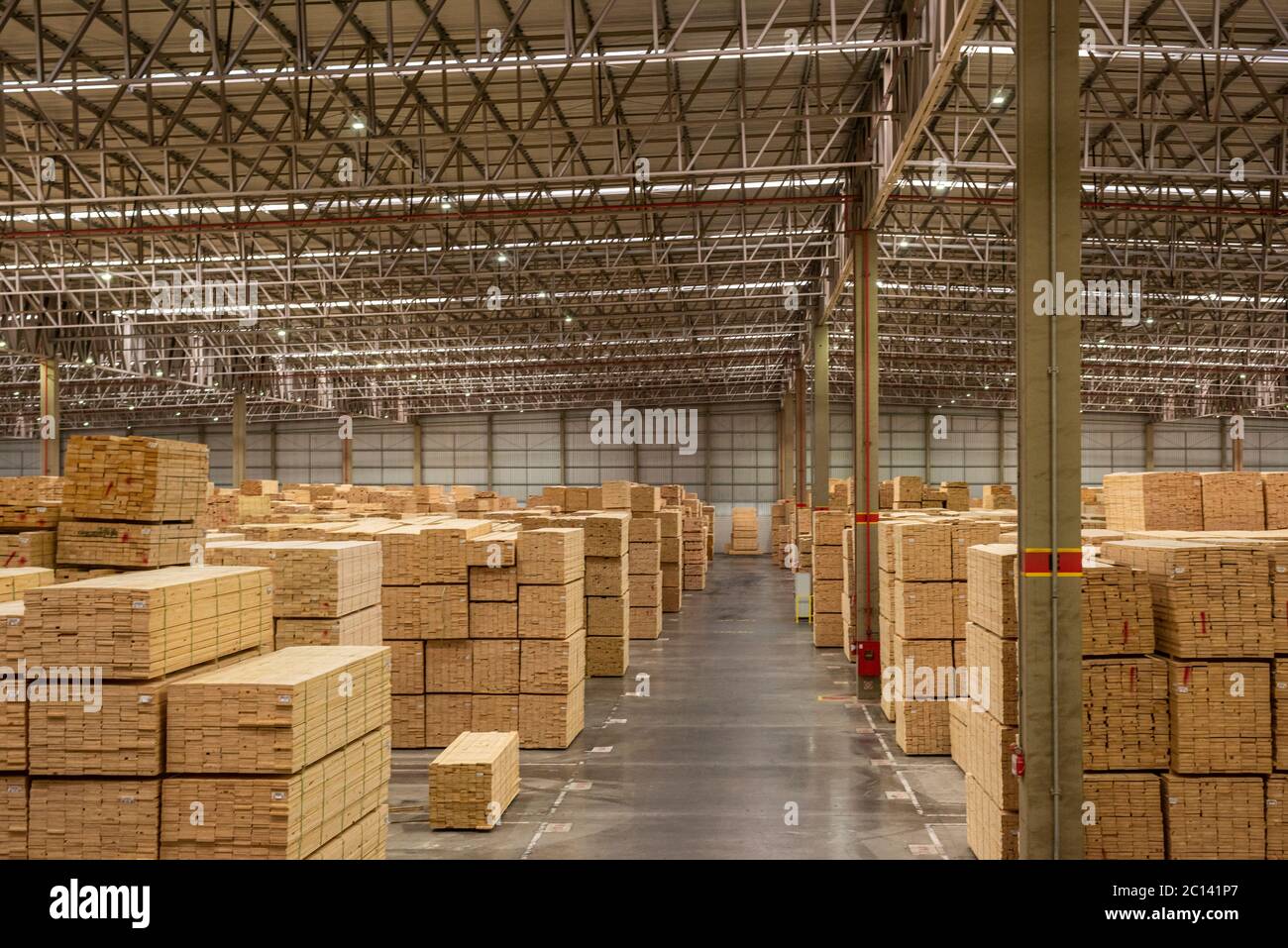 wooden factory piles pallets storage inside shed Stock Photo - Alamy