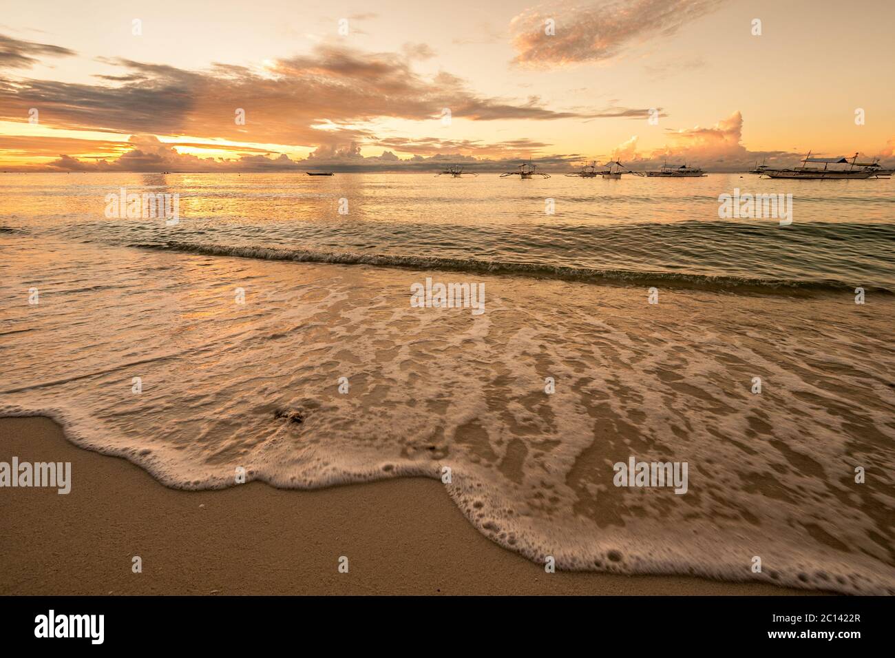Tropical beach sunset at Philippines Stock Photo - Alamy