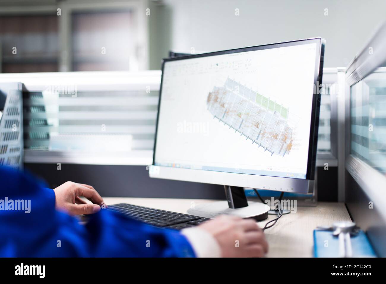 designs mechanical drawing on screen Stock Photo - Alamy
