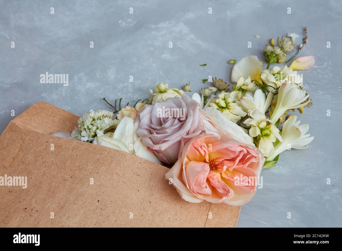 Flowers and an envelope Stock Photo - Alamy