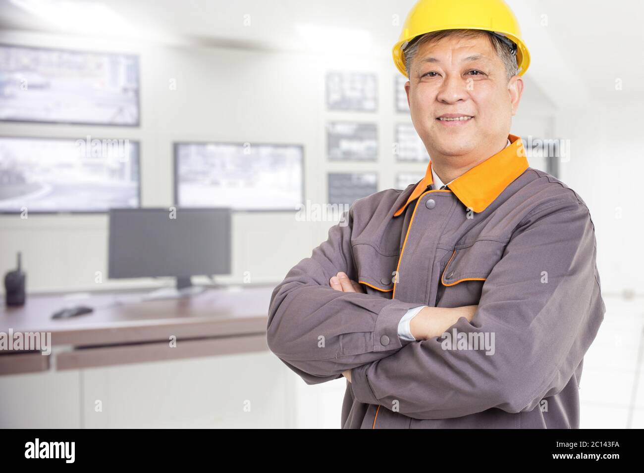 old asian man engineer in modern factory Stock Photo - Alamy