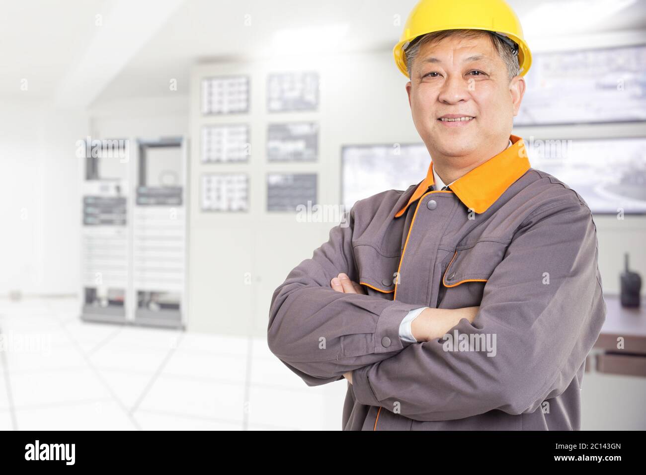 old asian man engineer in modern factory Stock Photo - Alamy