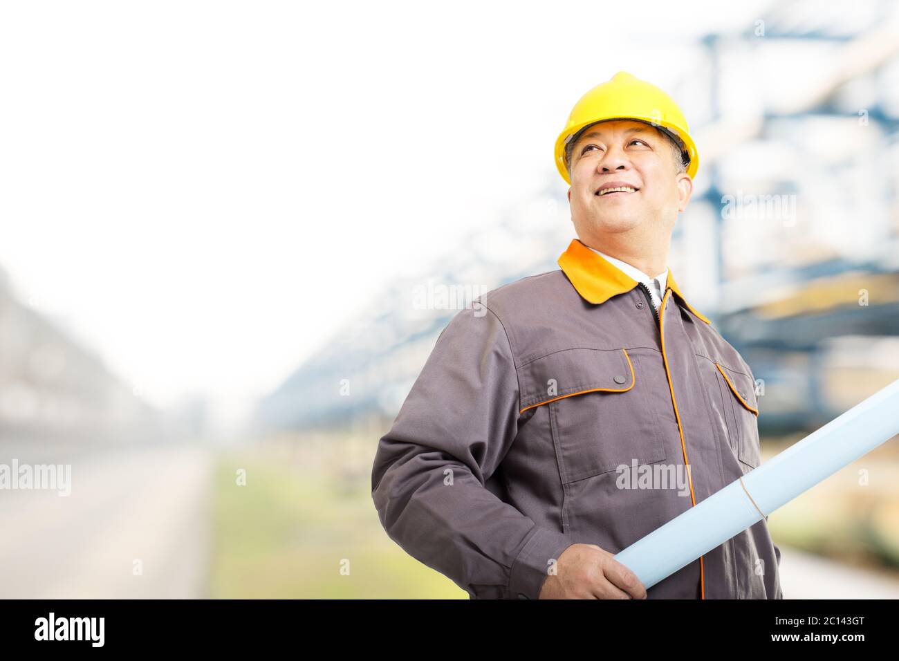old chinese man engineer in oil refinery plant Stock Photo - Alamy