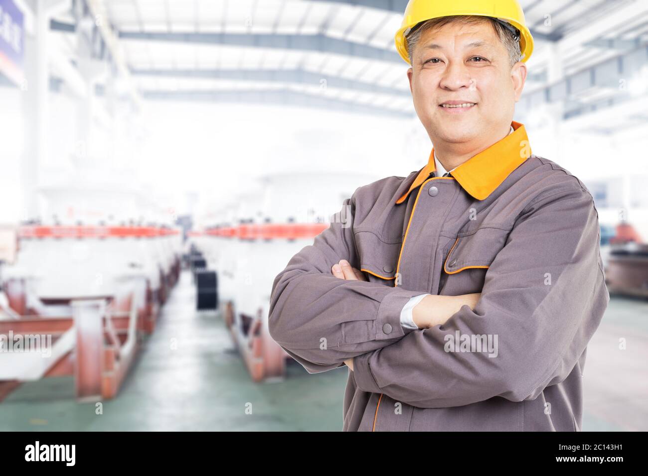 old asian man engineer in modern factory Stock Photo - Alamy