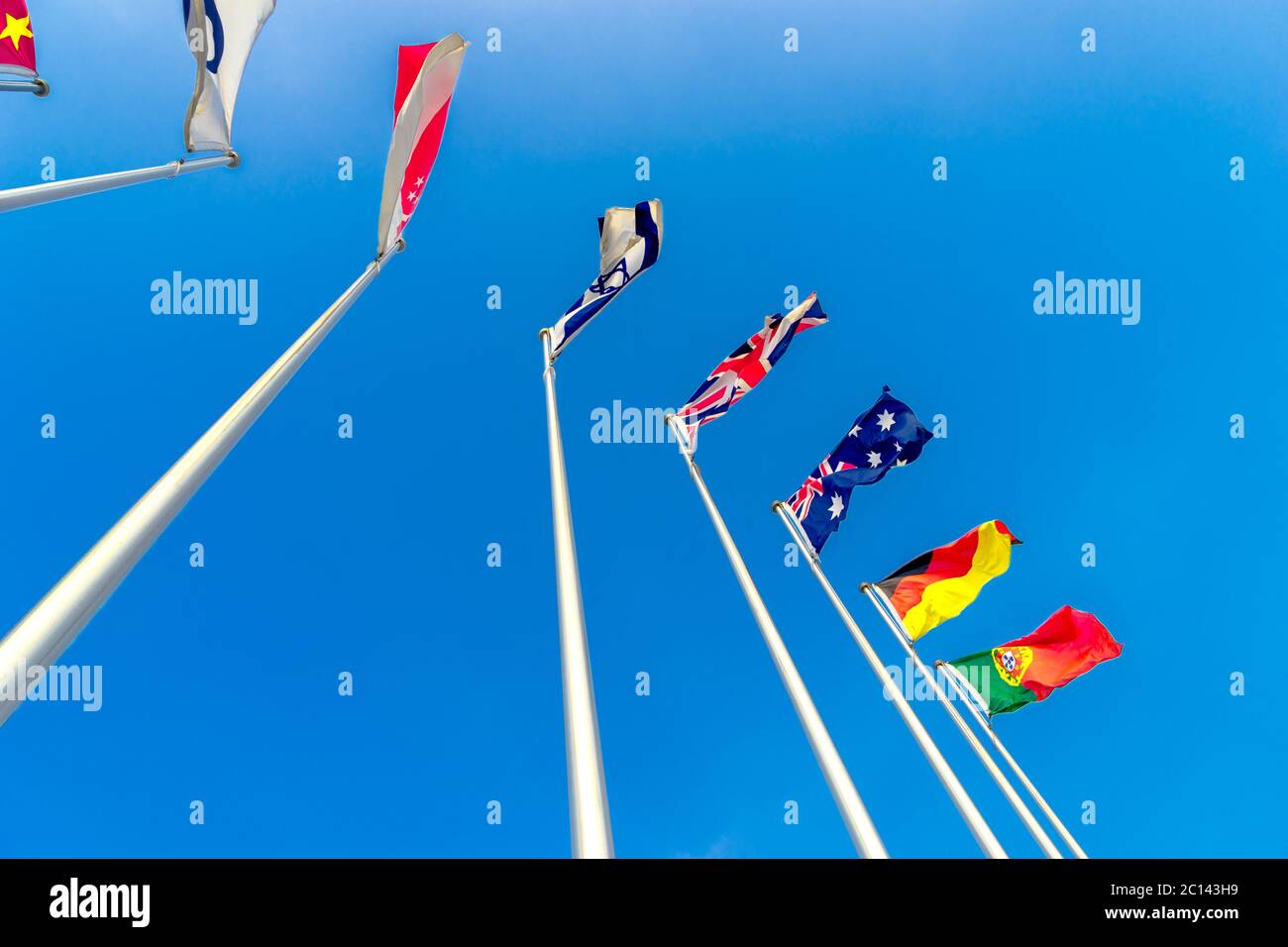 national flags flying in wind Stock Photo - Alamy