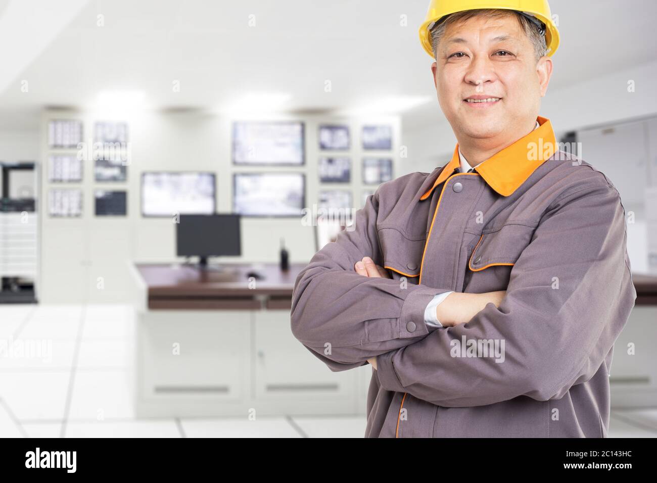 old asian man engineer in modern factory Stock Photo - Alamy