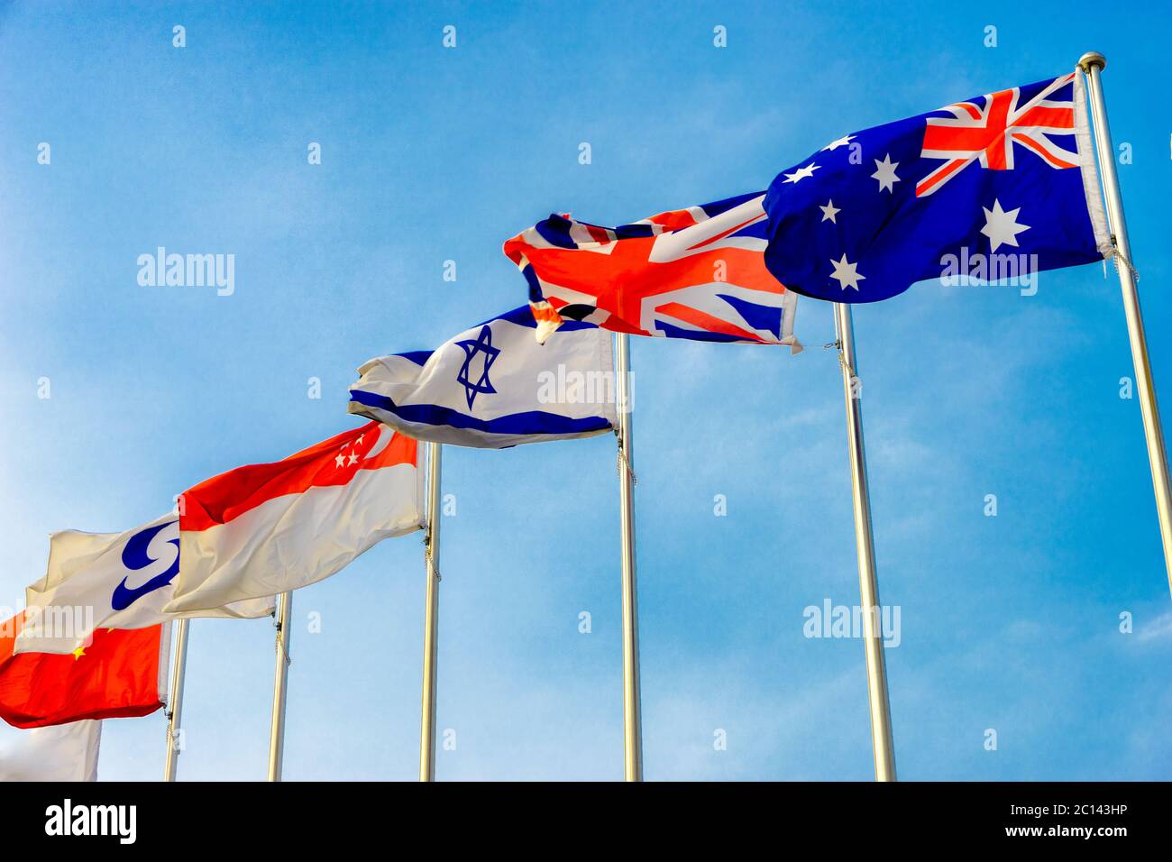 national flags flying in wind Stock Photo - Alamy
