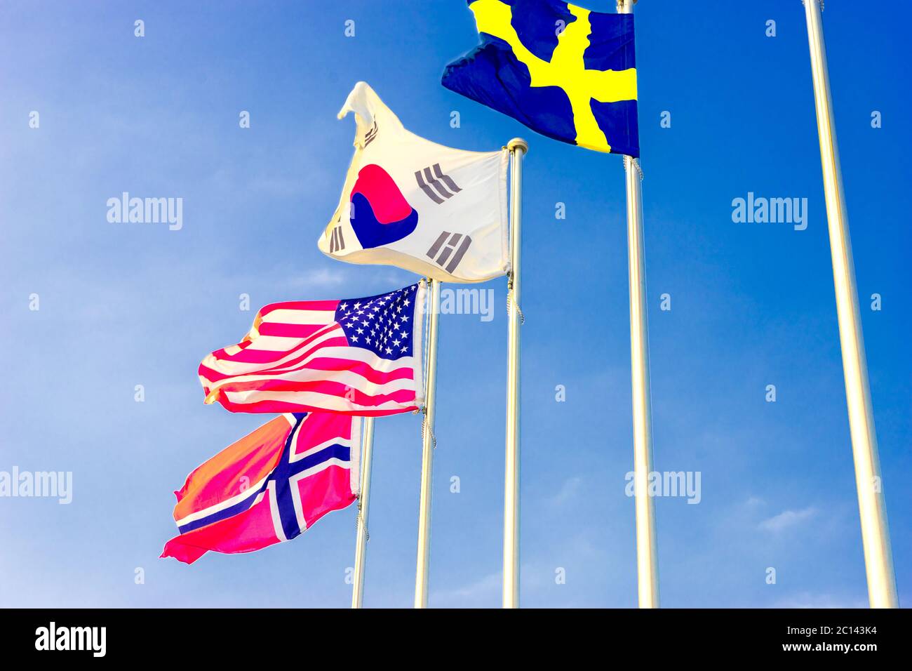 national flags flying in wind Stock Photo - Alamy