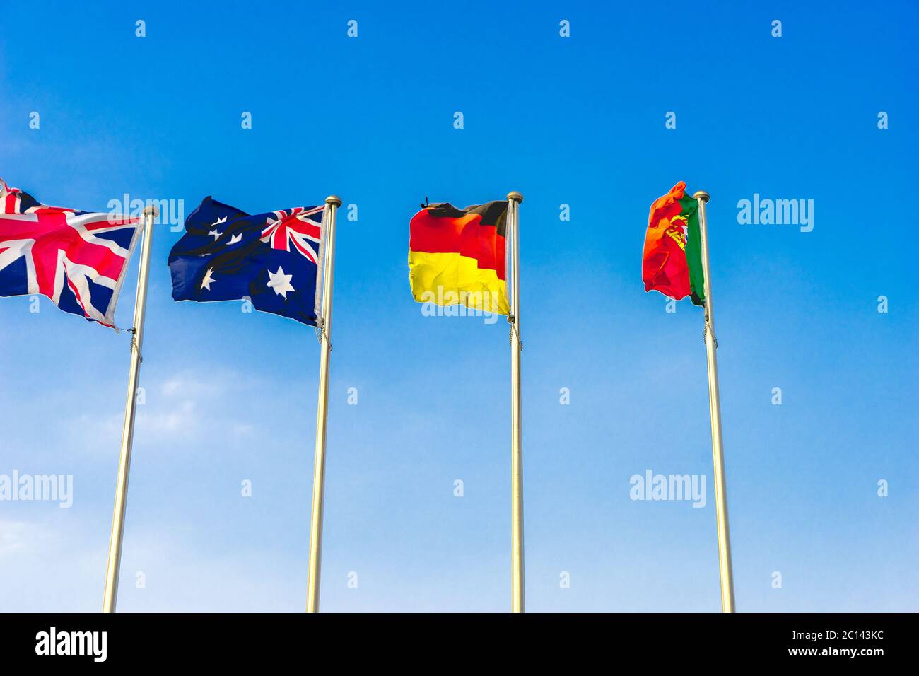 national flags flying in wind Stock Photo - Alamy