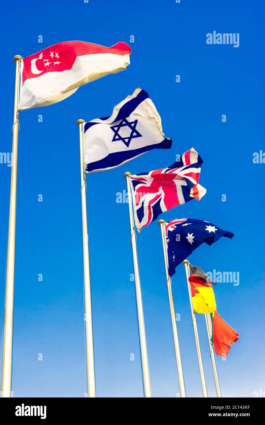 national flags flying in wind Stock Photo - Alamy