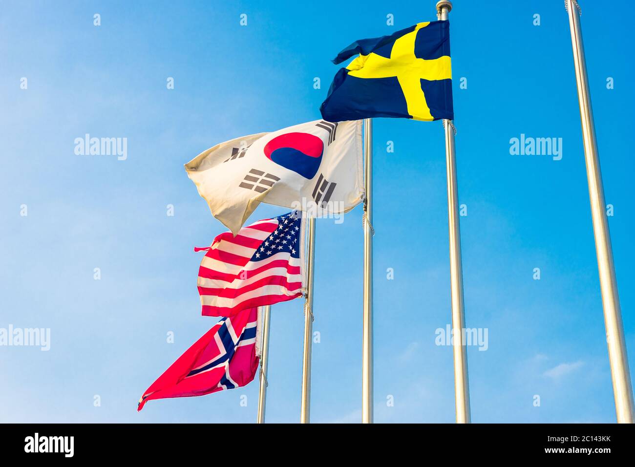 national flags flying in wind Stock Photo - Alamy