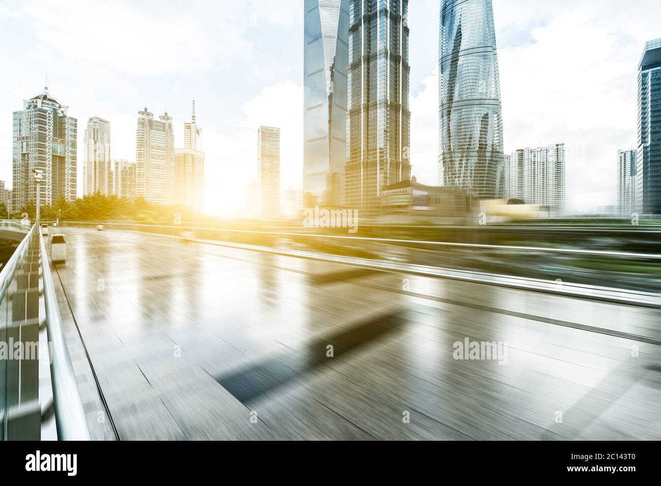elevated road in modern city with sunbeam Stock Photo - Alamy