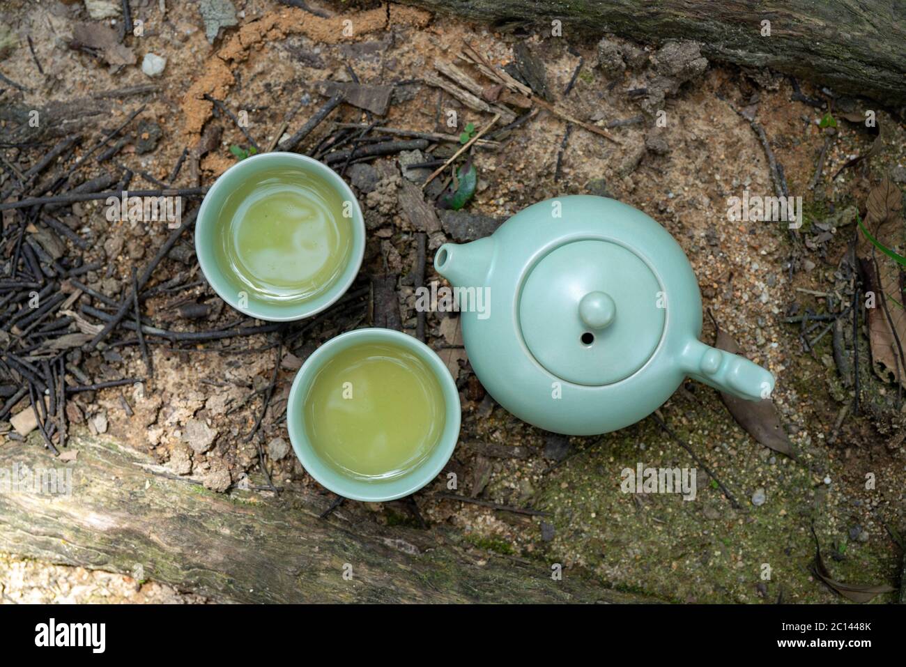 Tea culture, outdoor tea set. Close up shot of the tea set on the floor ...