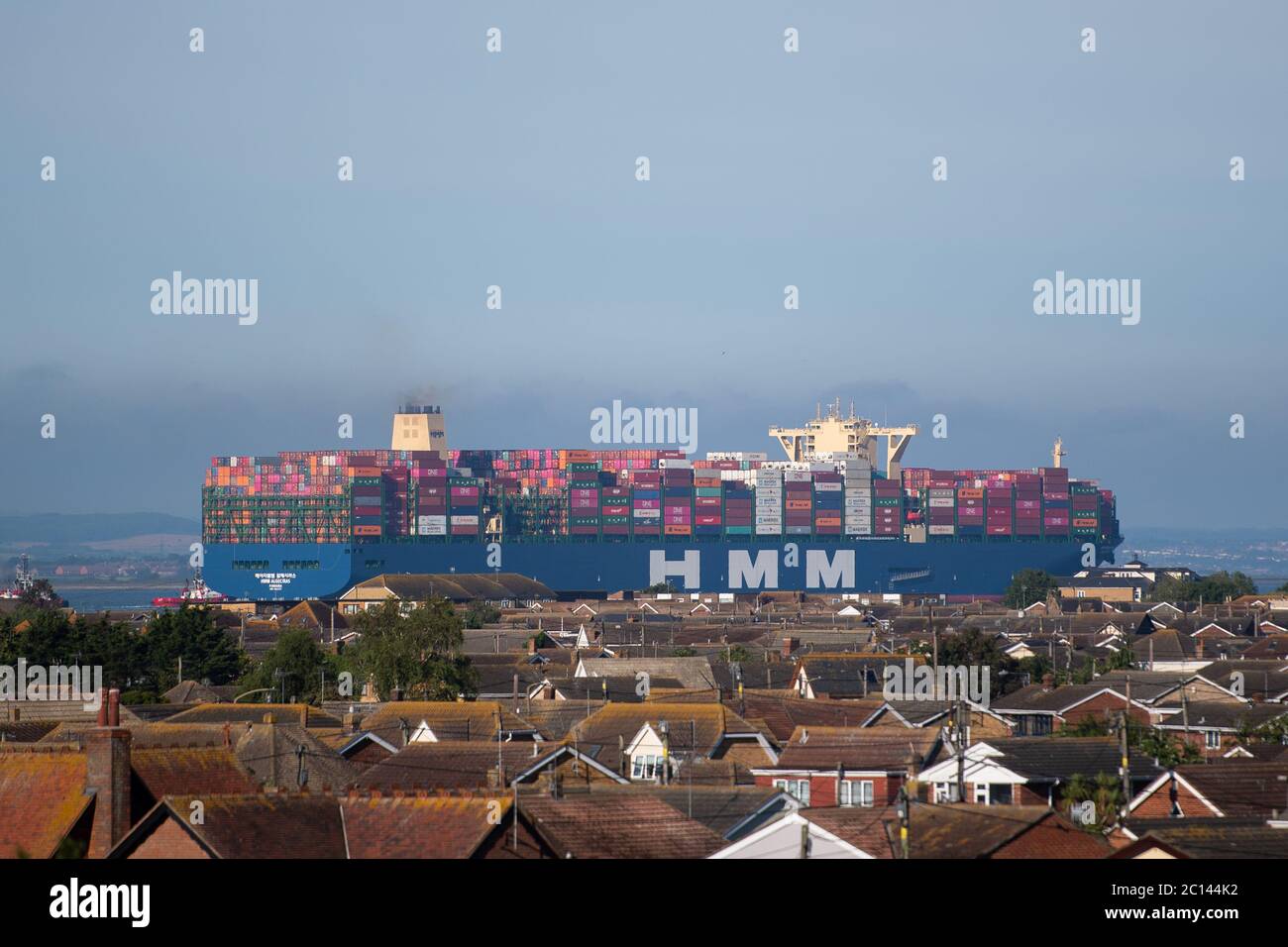 HMM Algeciras, the world's largest container ship, passes Canvey Island ...