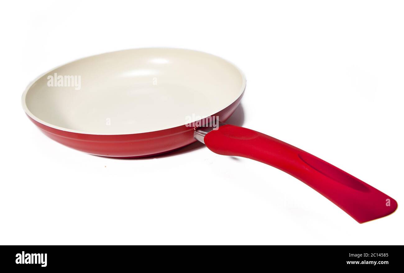 red frying pan Stock Photo - Alamy