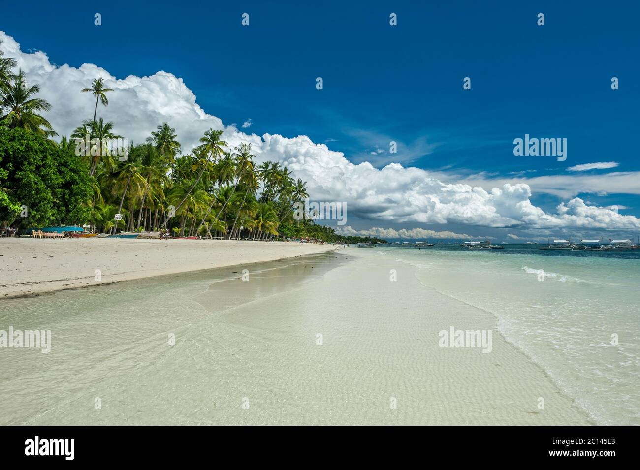 Tropical beach with palm trees at Philippines Stock Photo - Alamy