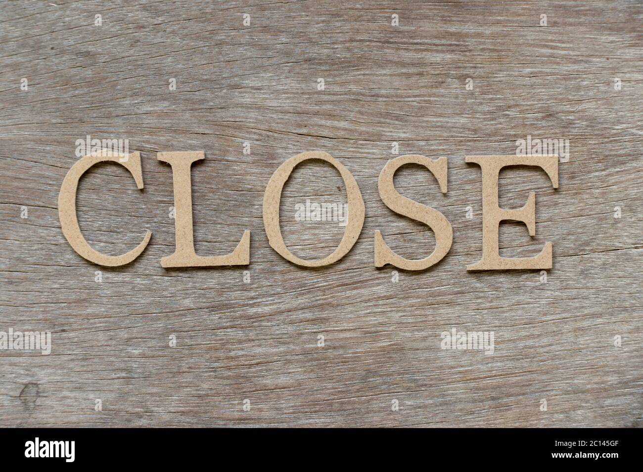 Alphabet letter in word close on wood background Stock Photo - Alamy