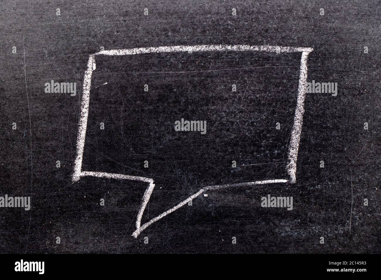 White chalk hand drawing in bubble speech shape with blank space for ...