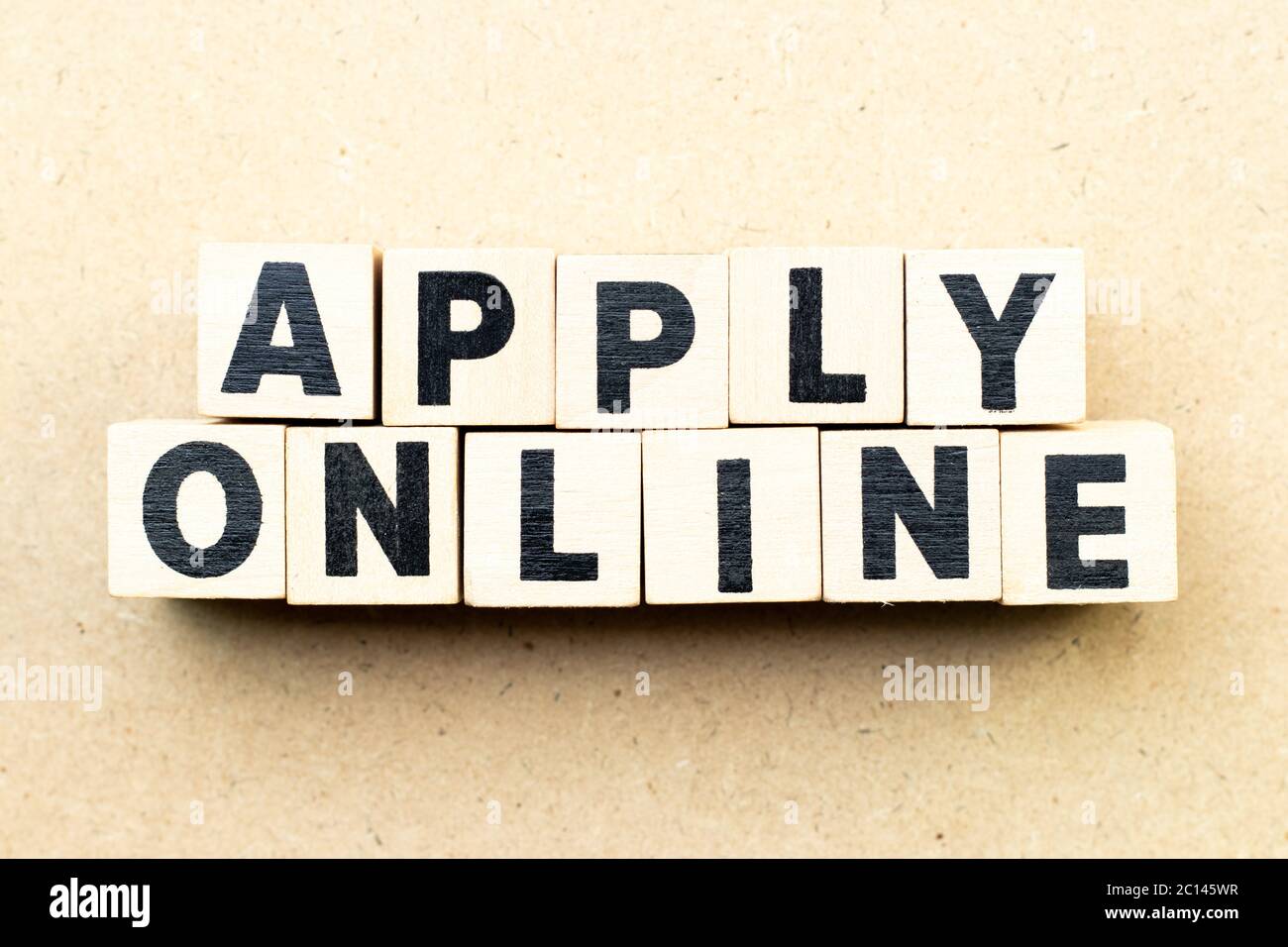 Alphabet letter block in word apply online on wood background Stock ...