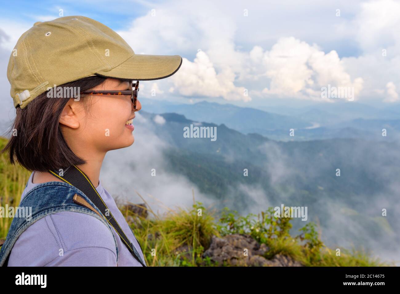 Hiker asian cute teens girl looking nature Stock Photo - Alamy