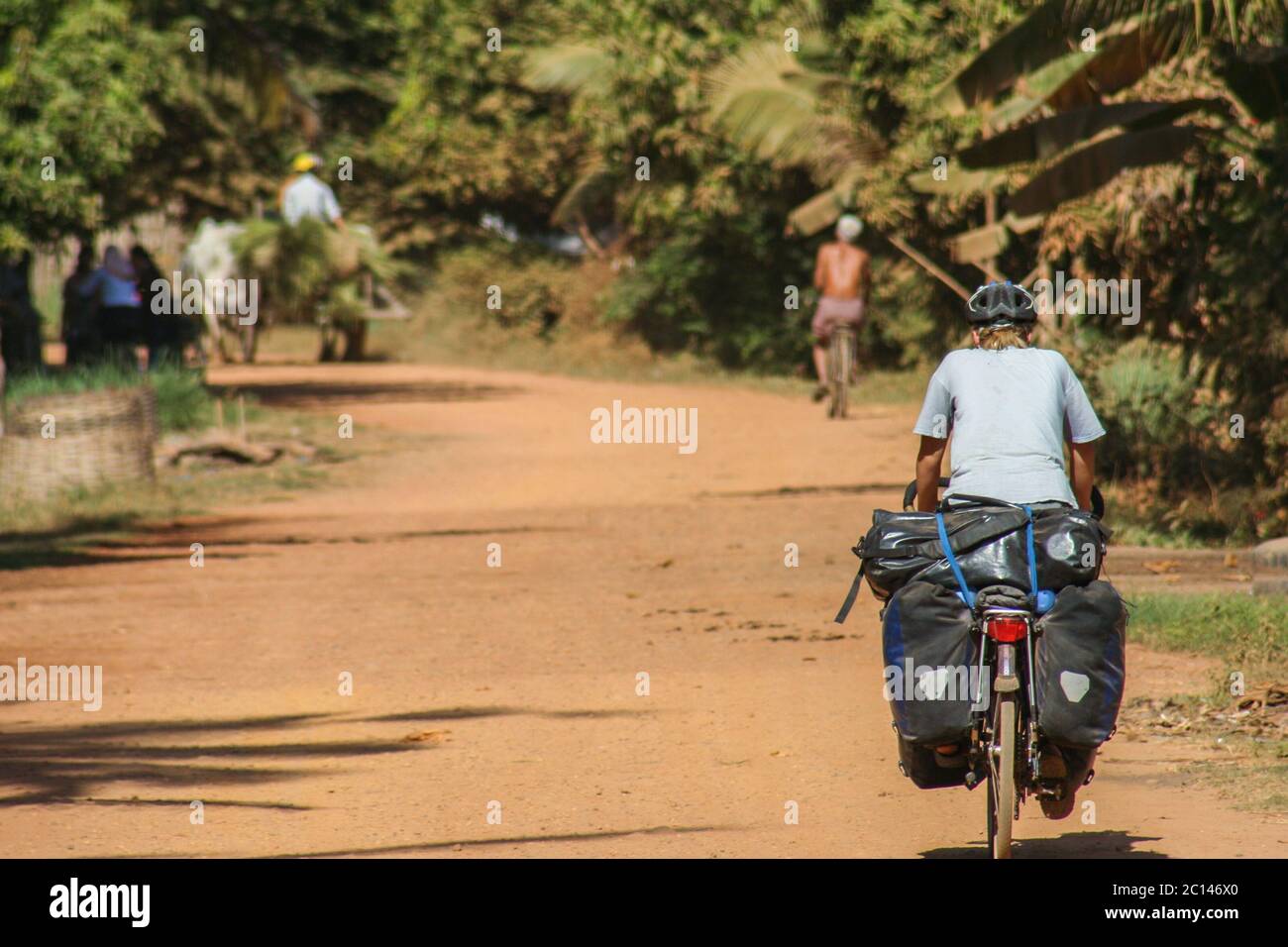 Cycle touring in Cambodia Stock Photo - Alamy