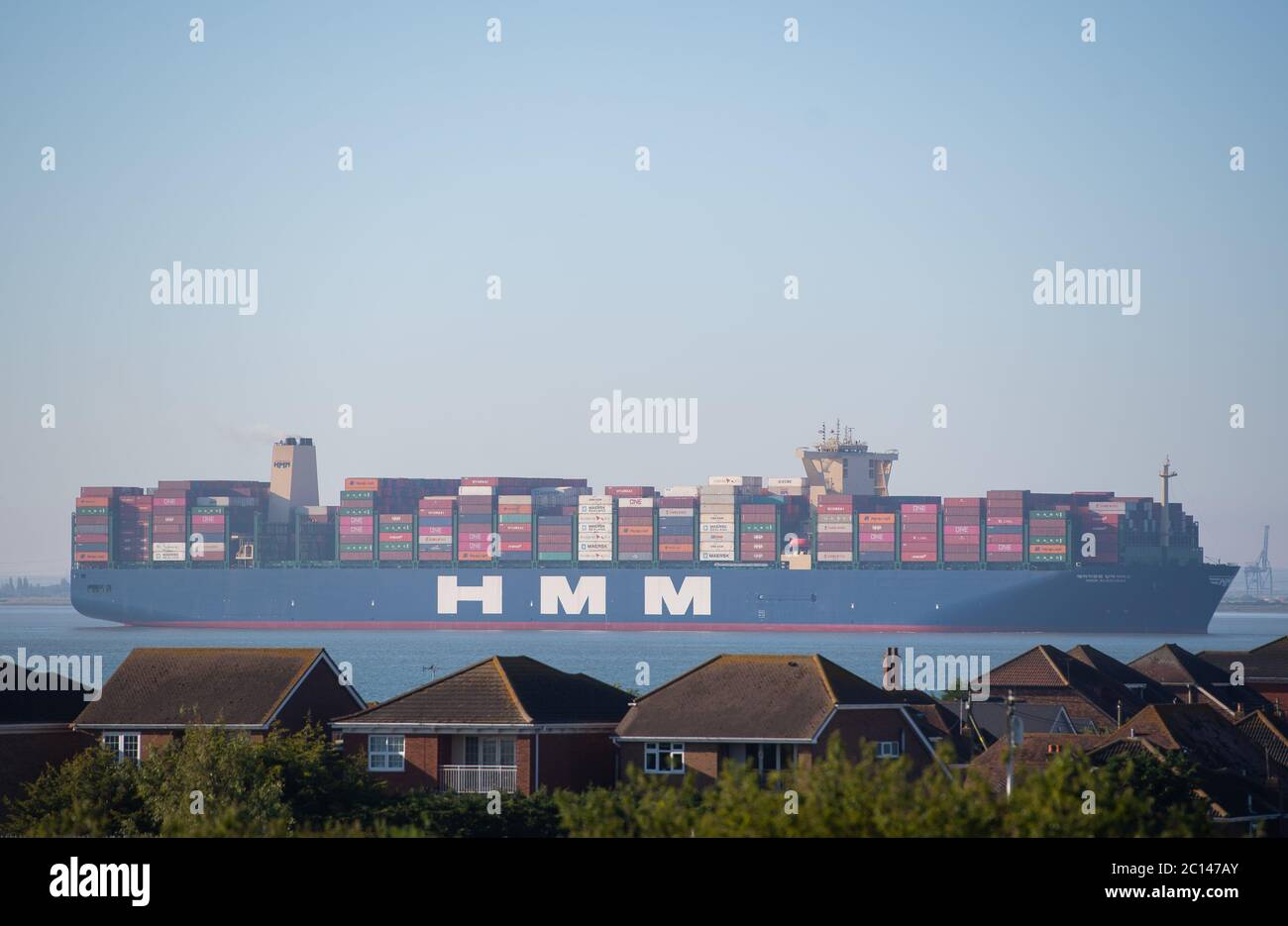 HMM Algeciras, the world's largest container ship, passes Canvey Island ...
