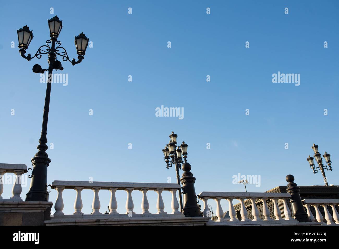 Lamp posts on pier railing hi-res stock photography and images - Alamy