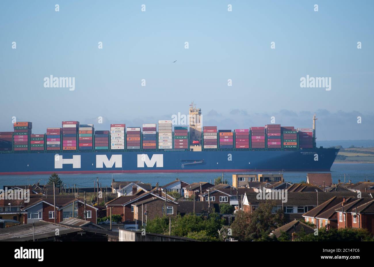 HMM Algeciras, the world's largest container ship, passes Canvey Island ...
