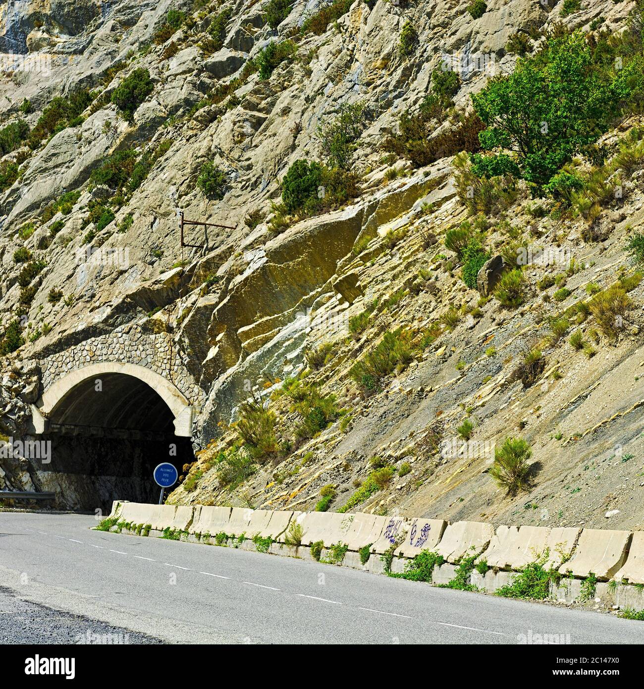Tunnel in the Rock Stock Photo - Alamy